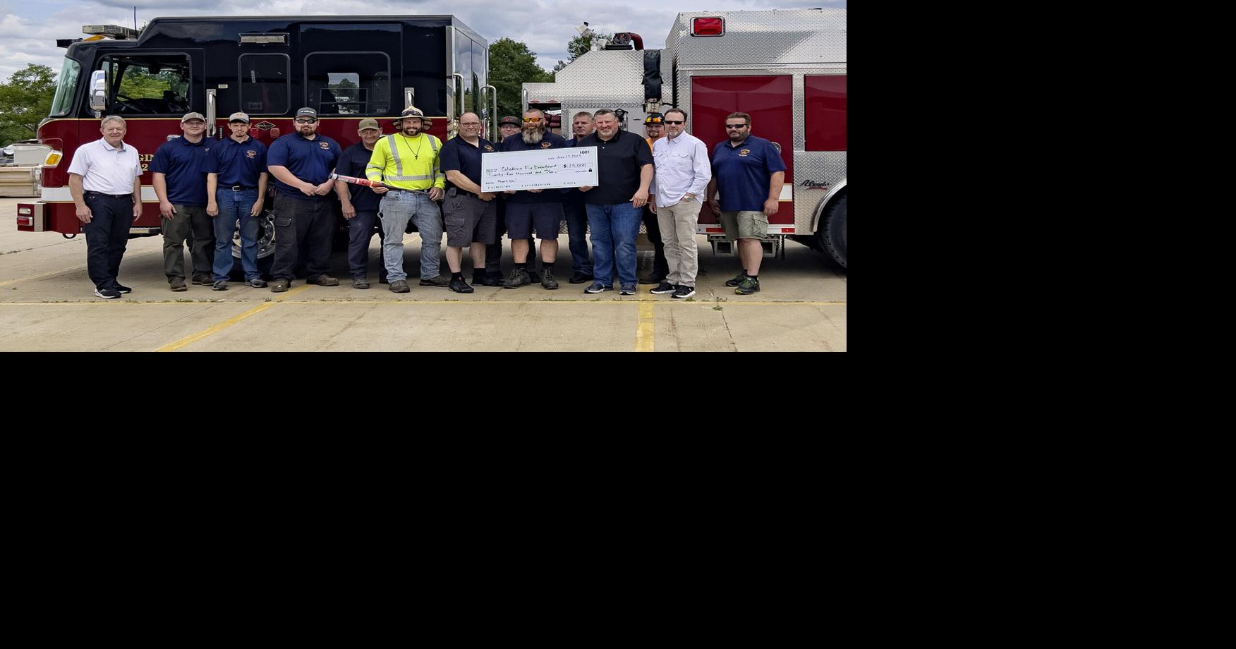 Rawlings/Miken present $25,000 check and commemorative bat to honor ...