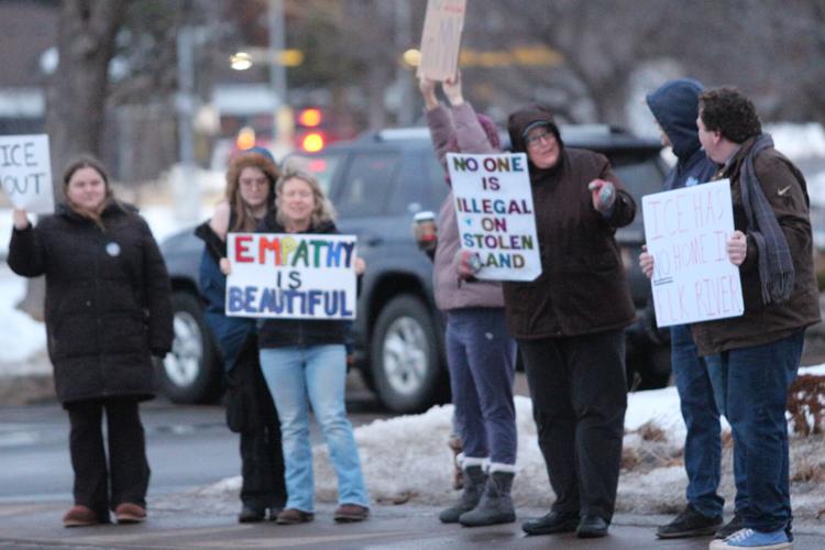 Elk River residents protest ICE action at New Hong Kong Buffet, owner ...