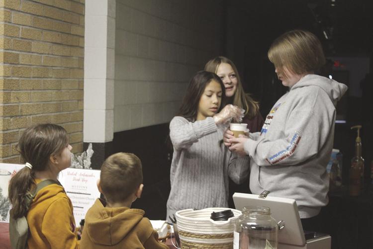 Pease helps holiday shoppers with annual Christmas Shoppe | Free ...