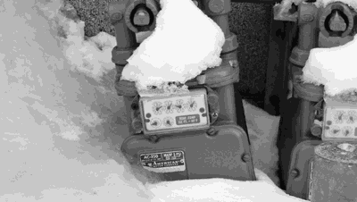 Snow accumulation can block vents and freeze natural gas meters | Free ...