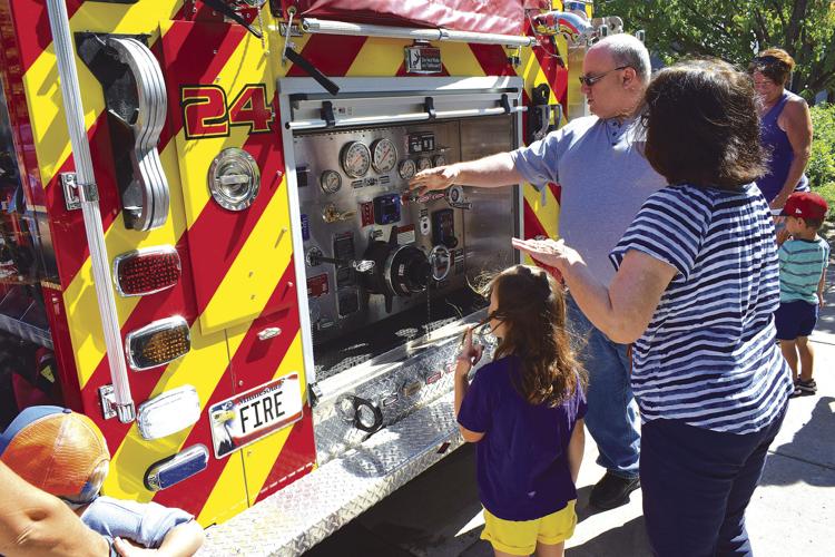 Families explore emergency vehicles at Wayzata City Hall ...