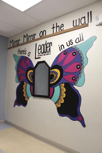 Teacher shares love for art, enhances school atmosphere | Education ...