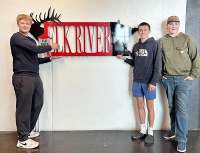 City accepts donation of hand-crafted sign from three DECA students ...