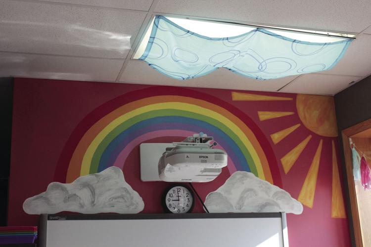 Teacher shares love for art, enhances school atmosphere | Education ...
