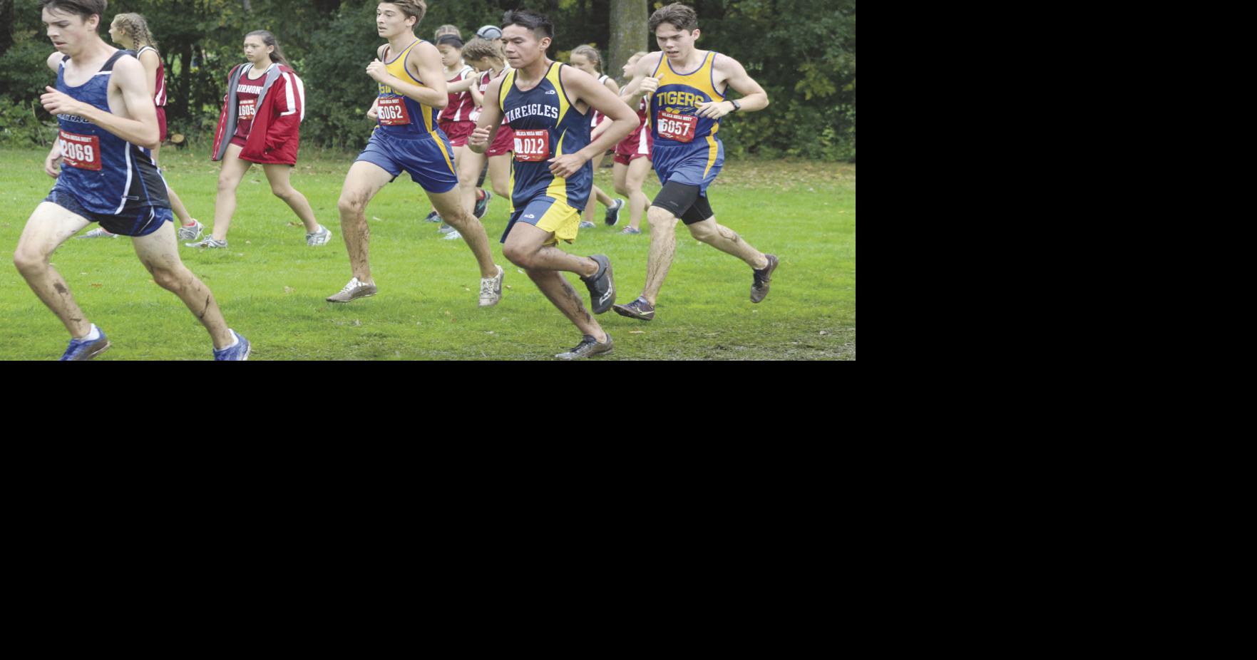 Local cross-country squads battle rain, mud and 6,000 competitors ...