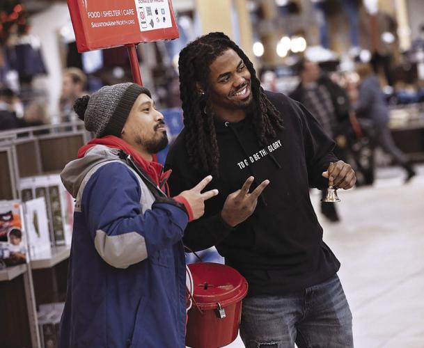 Vikings K.J. Osborn rings bells for the Salvation Army in Eden Prairie ...