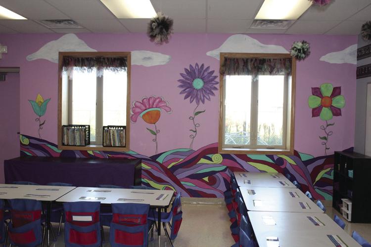 Teacher shares love for art, enhances school atmosphere | Education ...