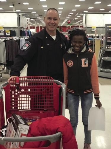 Champlin Target aisles filled with smiles during annual Shop with a Cop ...