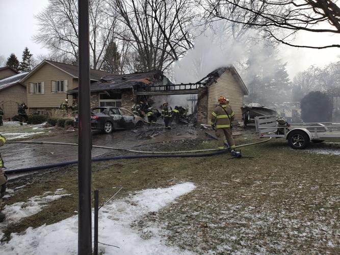 Maple Grove firefighters battle garage fire | Local News ...