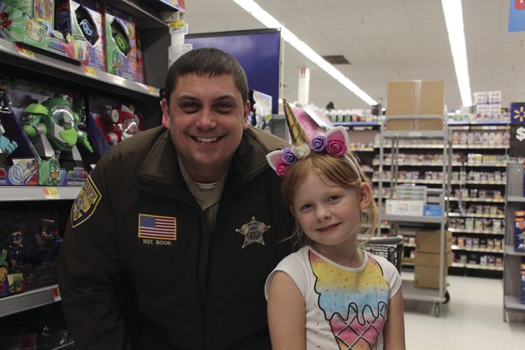 Shop With a Cop event spreads holiday cheer | County News Review ...