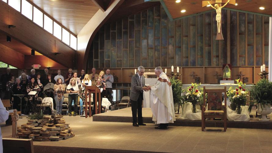 St. George Catholic Church celebrates minister’s 40th year behind the ...