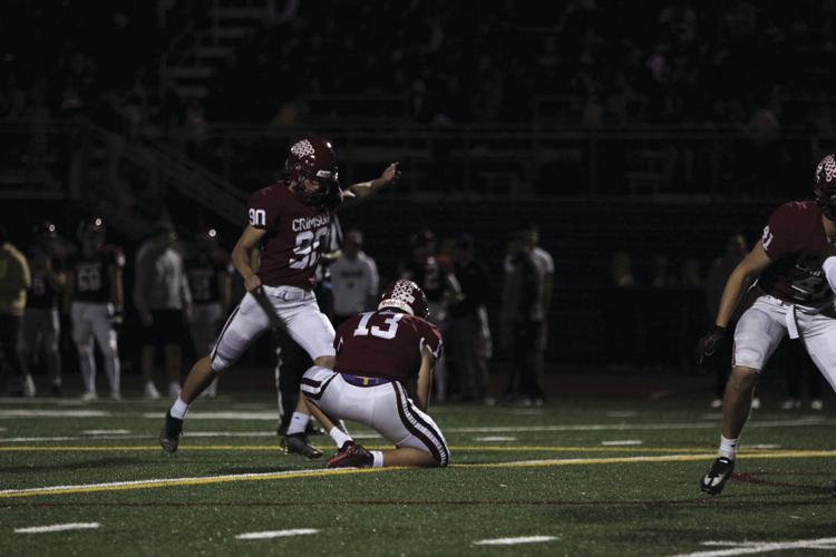 Crimson football stays undefeated after thrilling win over Champlin ...