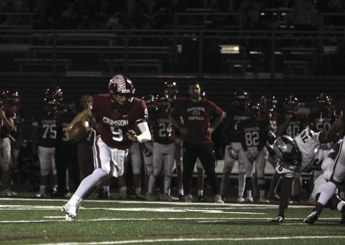 Crimson football stays undefeated after thrilling win over Champlin ...
