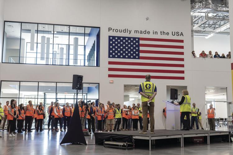 Graco unveils new worldwide distribution center in Dayton | Free ...