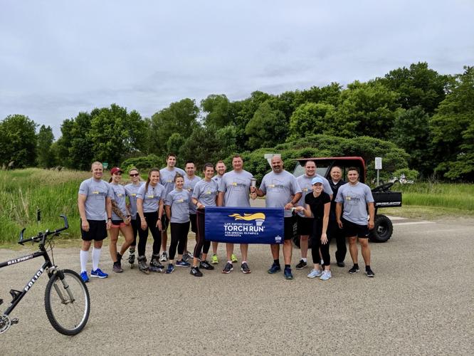 Passing the torch | Forest Lake Times | hometownsource.com