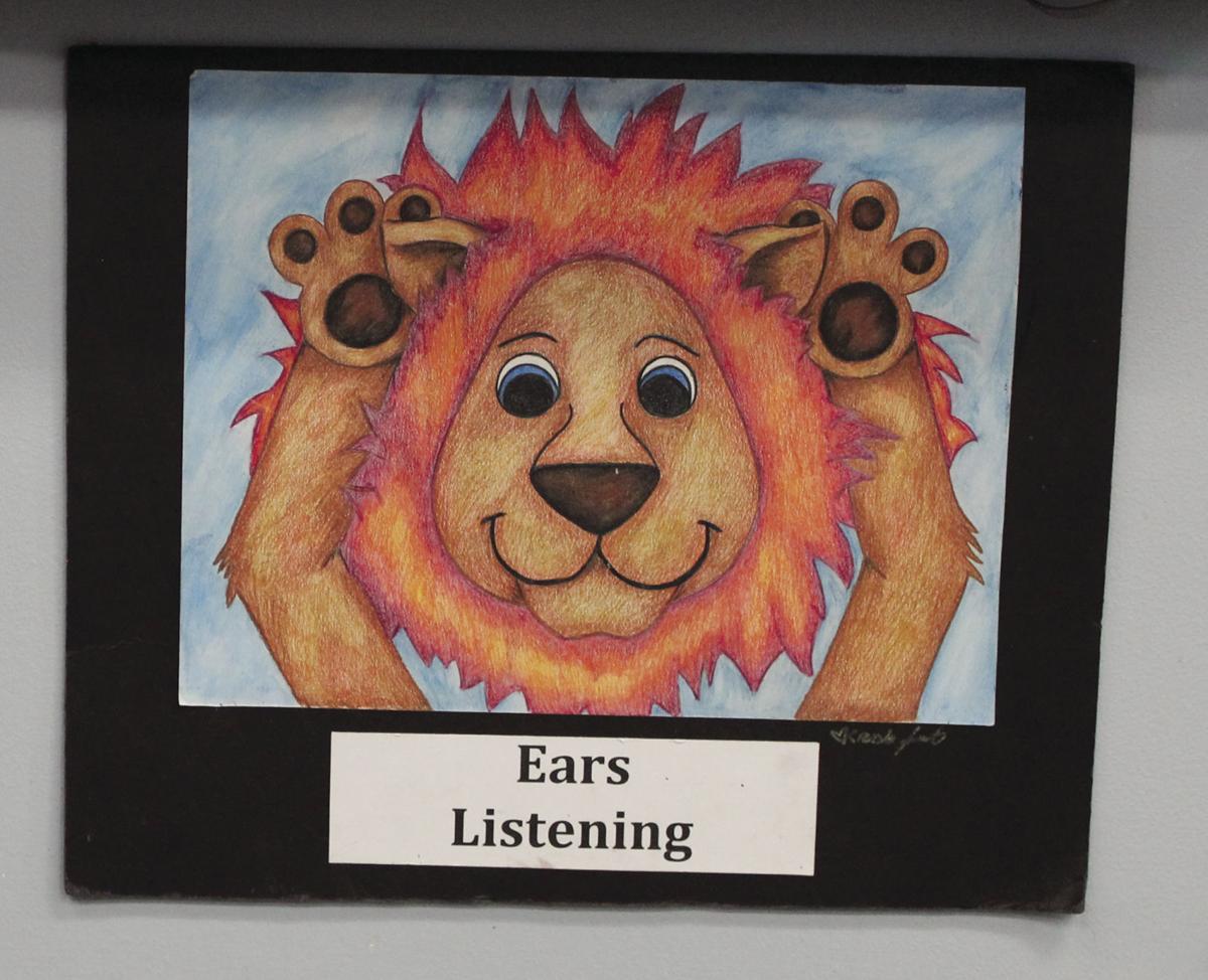 Teacher shares love for art, enhances school atmosphere | Education ...