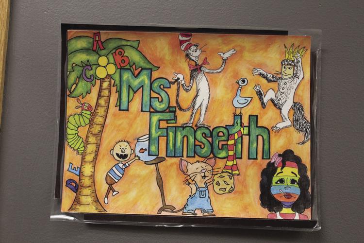 Teacher shares love for art, enhances school atmosphere | Education ...