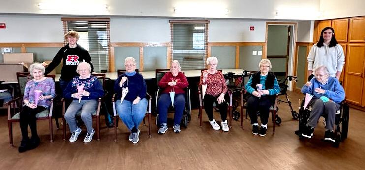 Joyful exchange at Guardian Angels thanks to NHS students | Elk River ...