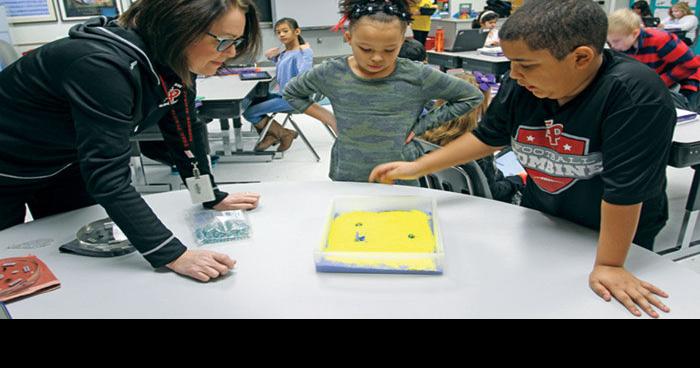 Eden Prairie's Oak Point Elementary students ‘hold the moon in their ...