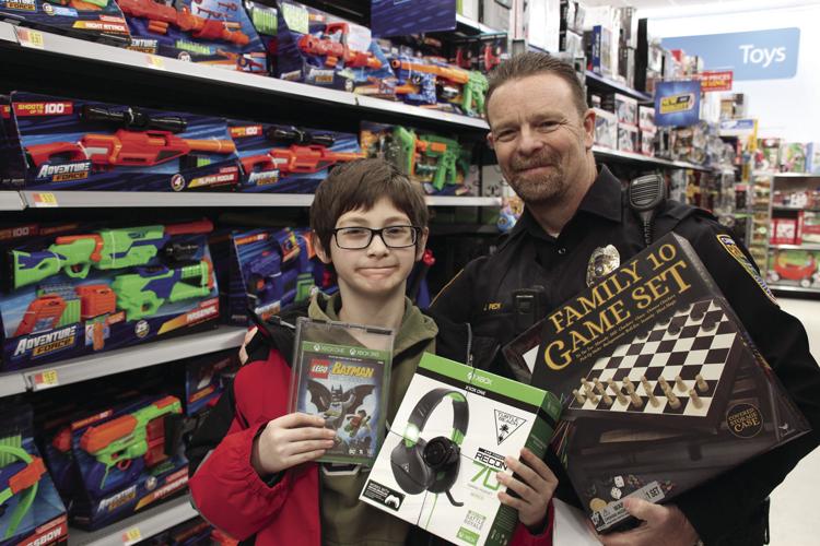 Shop With a Cop event spreads holiday cheer | County News Review ...