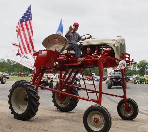 A tractor on stilts? Yep, was seen at the Hillman parade | Local News ...