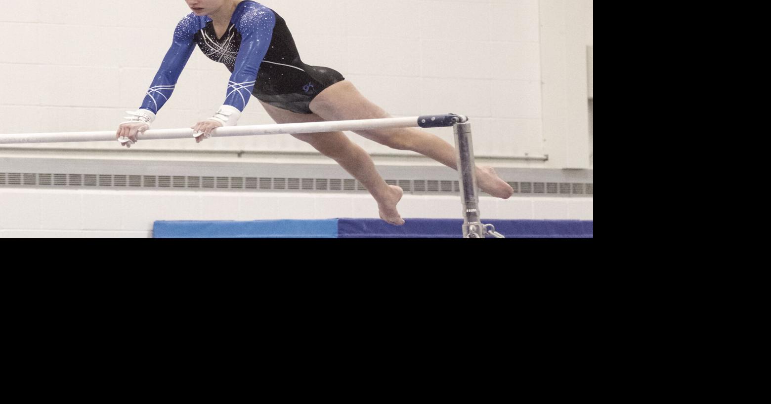 Rogers gymnasts in action | Free | hometownsource.com