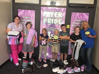 Randall Cushing Lions donate items to Dr. S.G. Knight Elementary ...