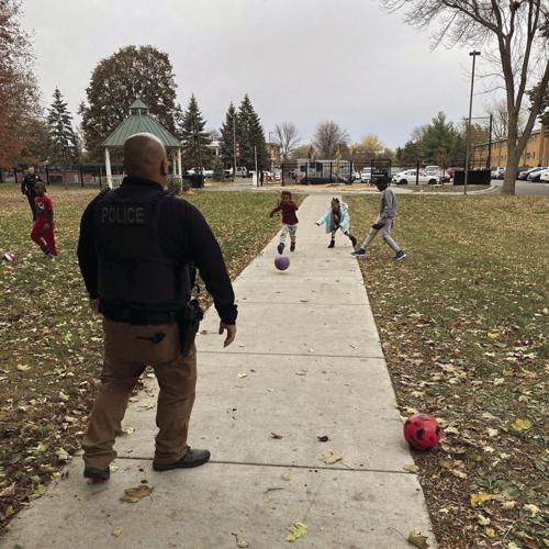PHOTOS: Community policing, touch football at Zanewood | Free ...