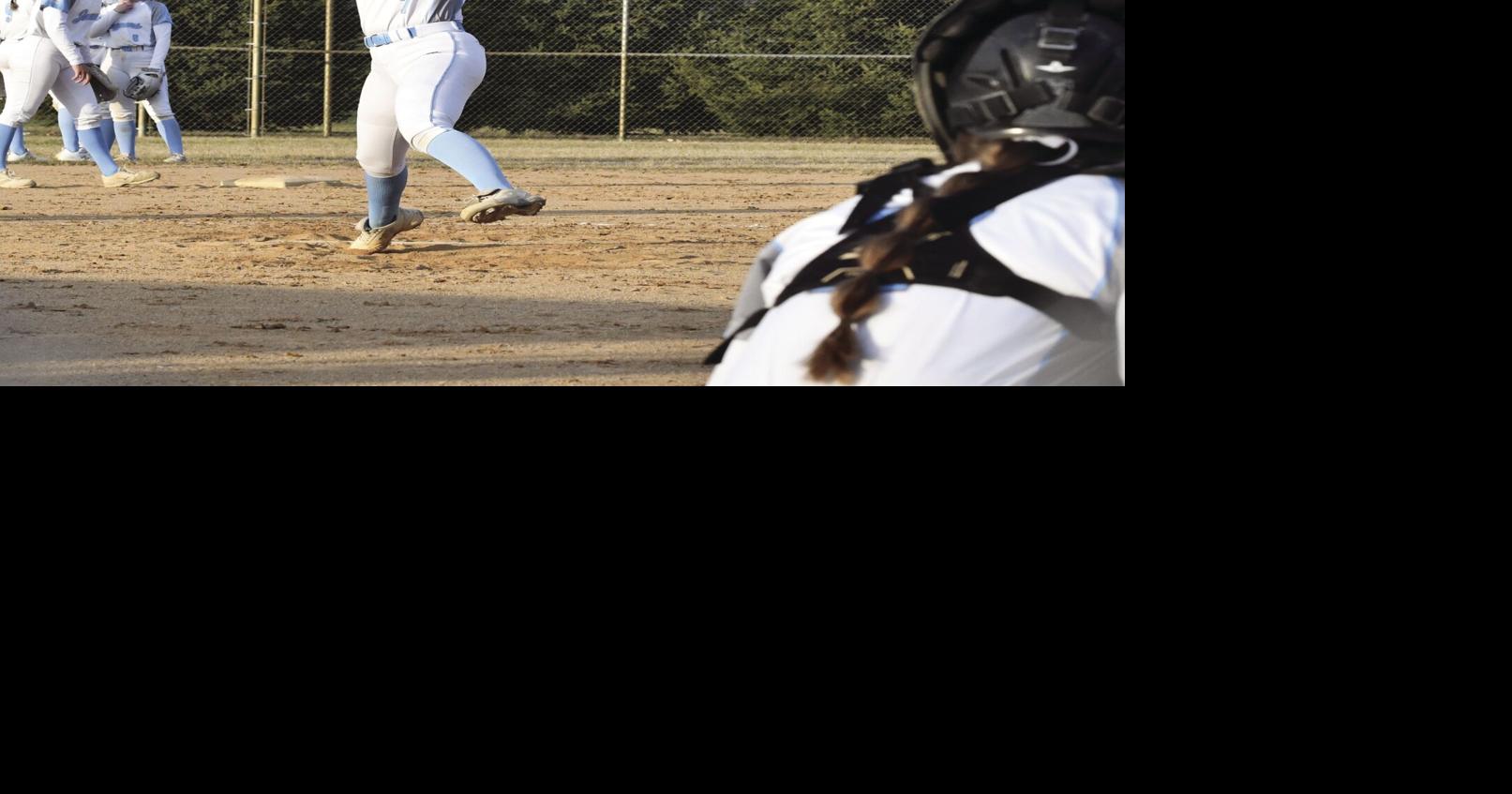 Softball teams dodge wet and cold to ramp up the conference schedule ...