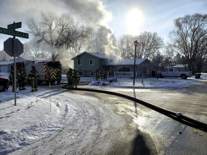 Firefighters battle house fire, cold temperatures in Maple Grove ...