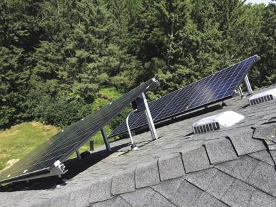 Solar array helps defray energy costs for disabled veteran | Sun This ...