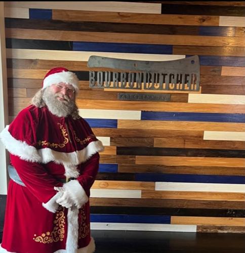 Keeping the holiday spirit alive: Bourbon Butcher employee brings joy ...