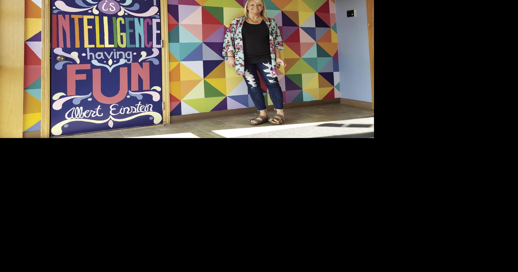 Teacher shares love for art, enhances school atmosphere | Education ...