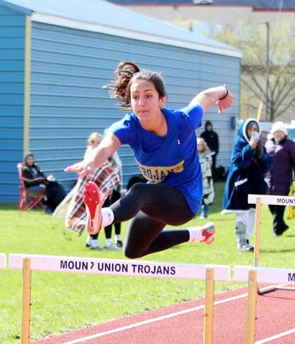 Trojan boys split, girls sweep | Sports | huntingdondailynews.com