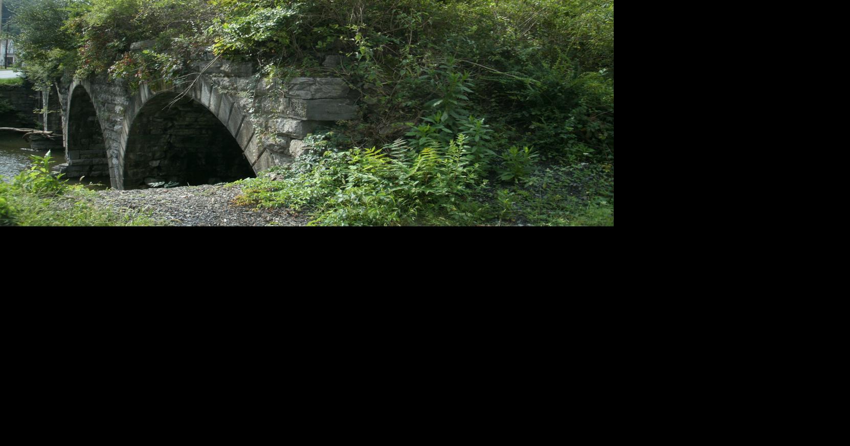 Rotarians continue stone arch bridge project | Local ...