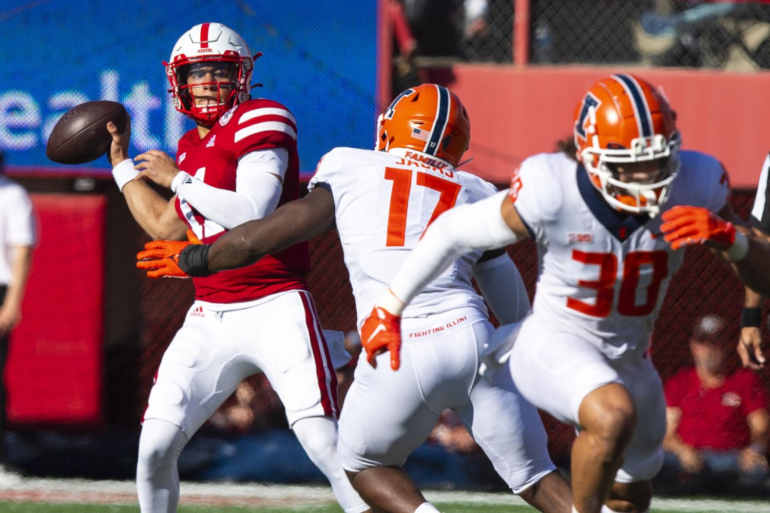 Sam McKewon teams up with Jim Polzin at the half of Wisconsin-Nebraska ...