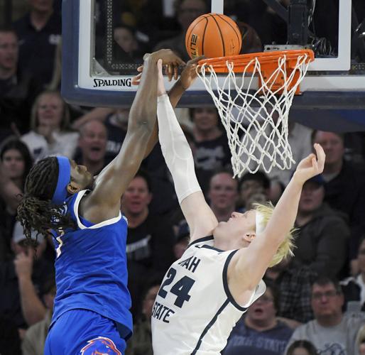 Broncos unable to take top spot in Mountain West, fall at Utah State ...