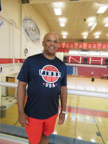 Students, parents rally together to protest termination of basketball ...