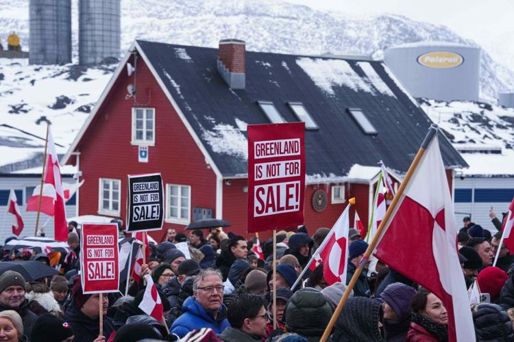 Photos show Greenlanders brave near-freezing temperatures to march ...