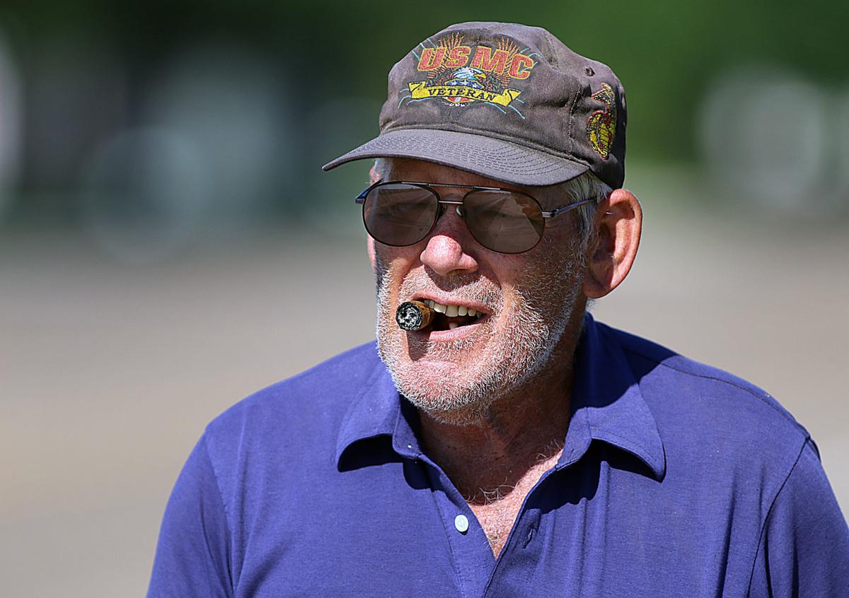 Stories from the street: Larry Meek walks and waves goodwill ...