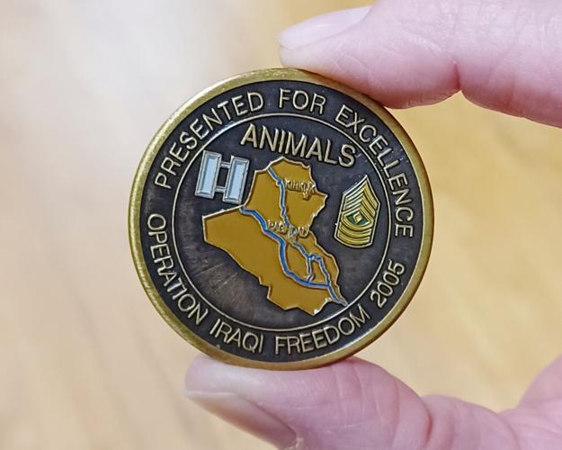 Surprise military coin presentation restirs memories nearly two decades ...