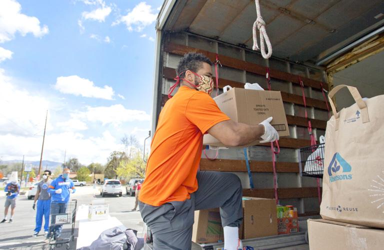 Boise State football players help gather donations for food pantries ...