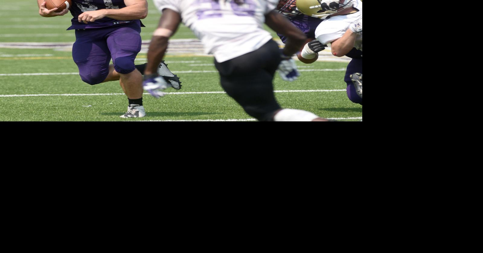 Yotes football team competes in open scrimmage for fans | Members ...