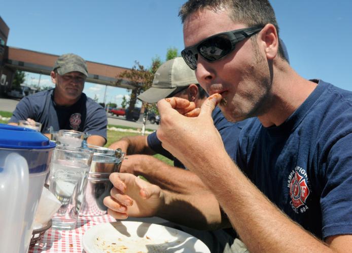 Rib-eating contest between Nampa police and firefighters | Photos ...