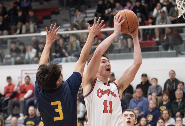 Owyhee pulls away in second half to defeat Meridian | High School ...