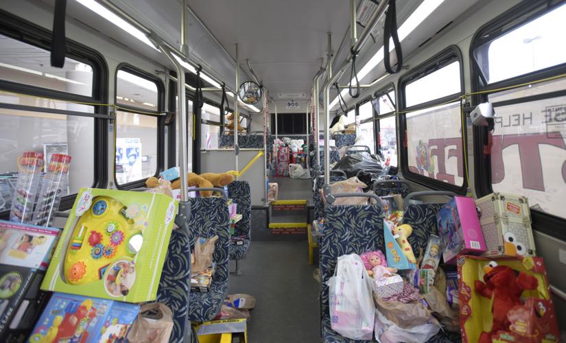 Stuff the Bus toy drive provides Christmas presents for local families ...