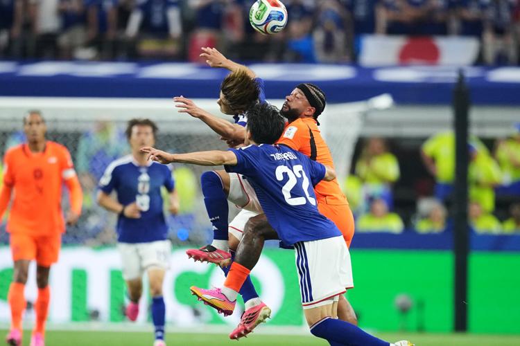 Daichi Kamada's late header gives Japan a 2-2 draw with the Netherlands ...