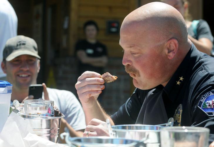 Rib-eating contest between Nampa police and firefighters | Photos ...