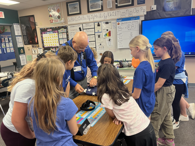 Mayor Petrie teaches Carberry Elementary students flag-folding and ...