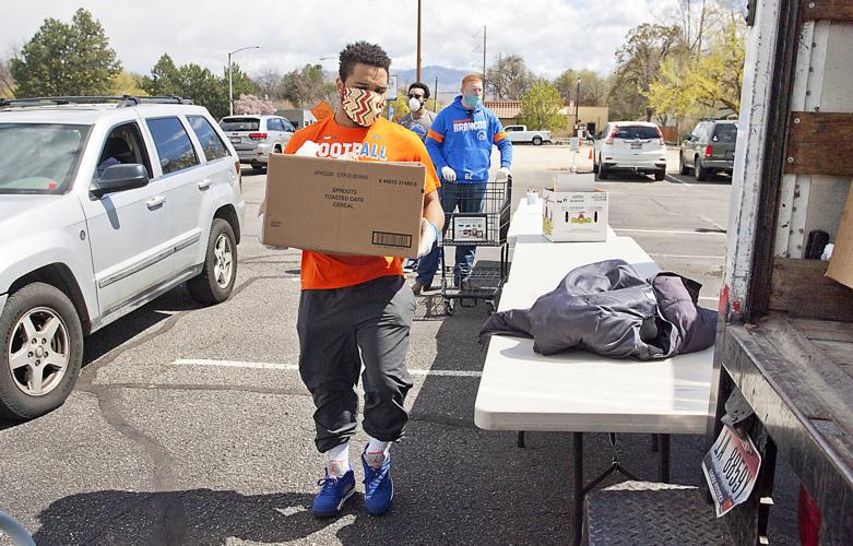 Boise State football players help gather donations for food pantries ...